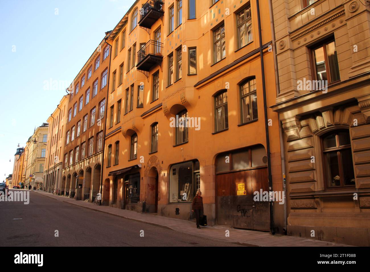 An aerial view of a bustling city street filled with modern high-rise ...