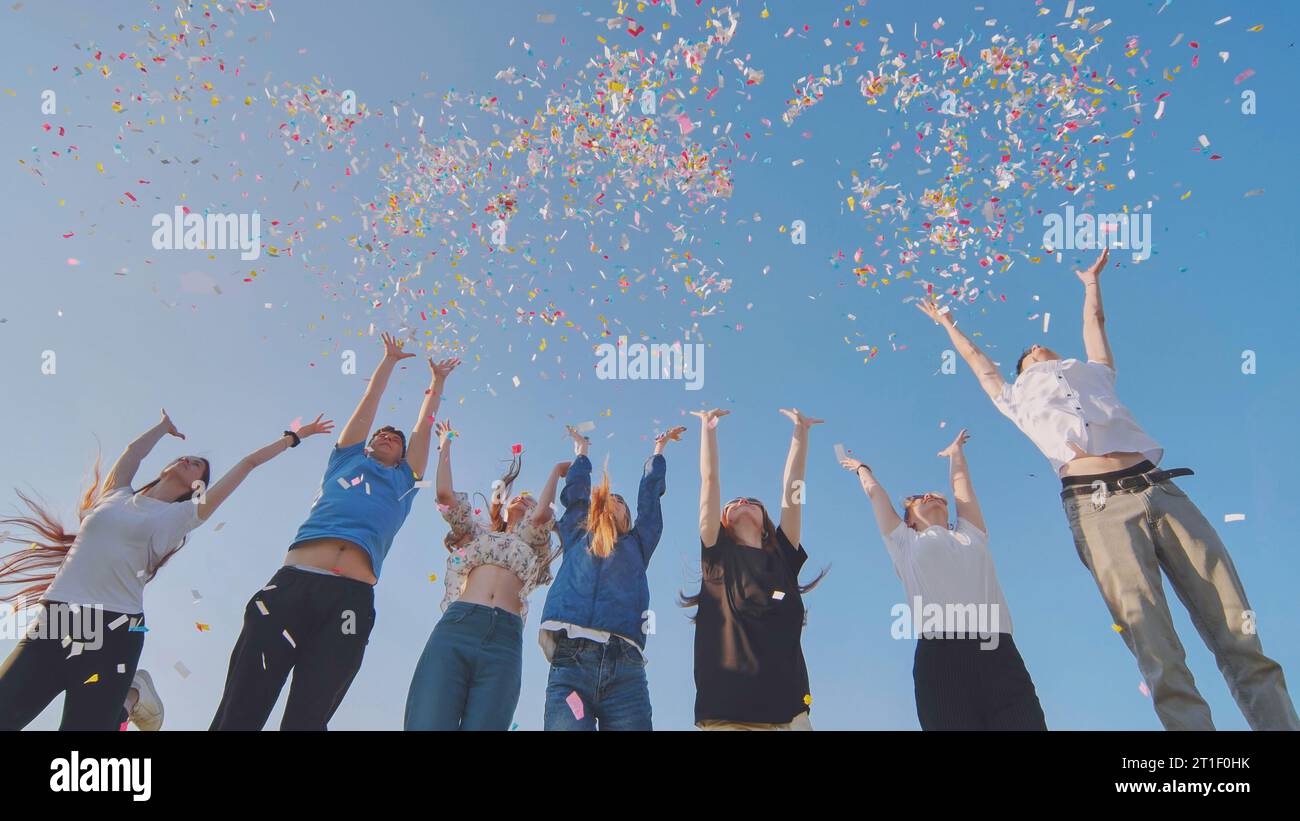 Group confetti toss hi-res stock photography and images - Alamy