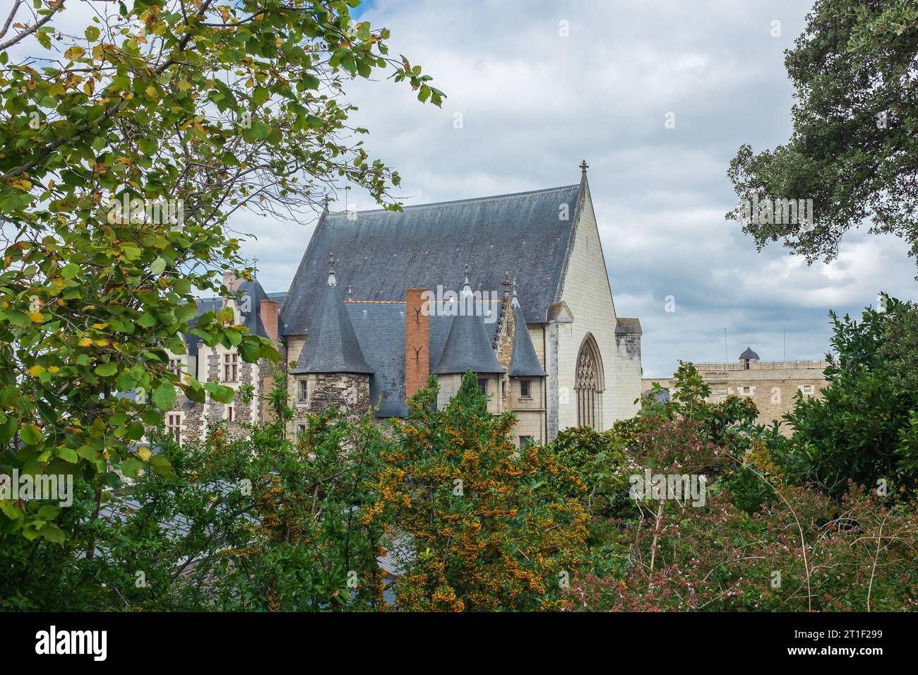Angers, France, 2023. The chapel and pointed turrets of the châtelet ...