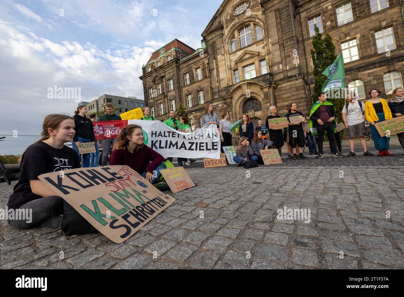 Dresden, Germany. 13th Oct, 2023. Several young people stand in front of the Saxon State ...