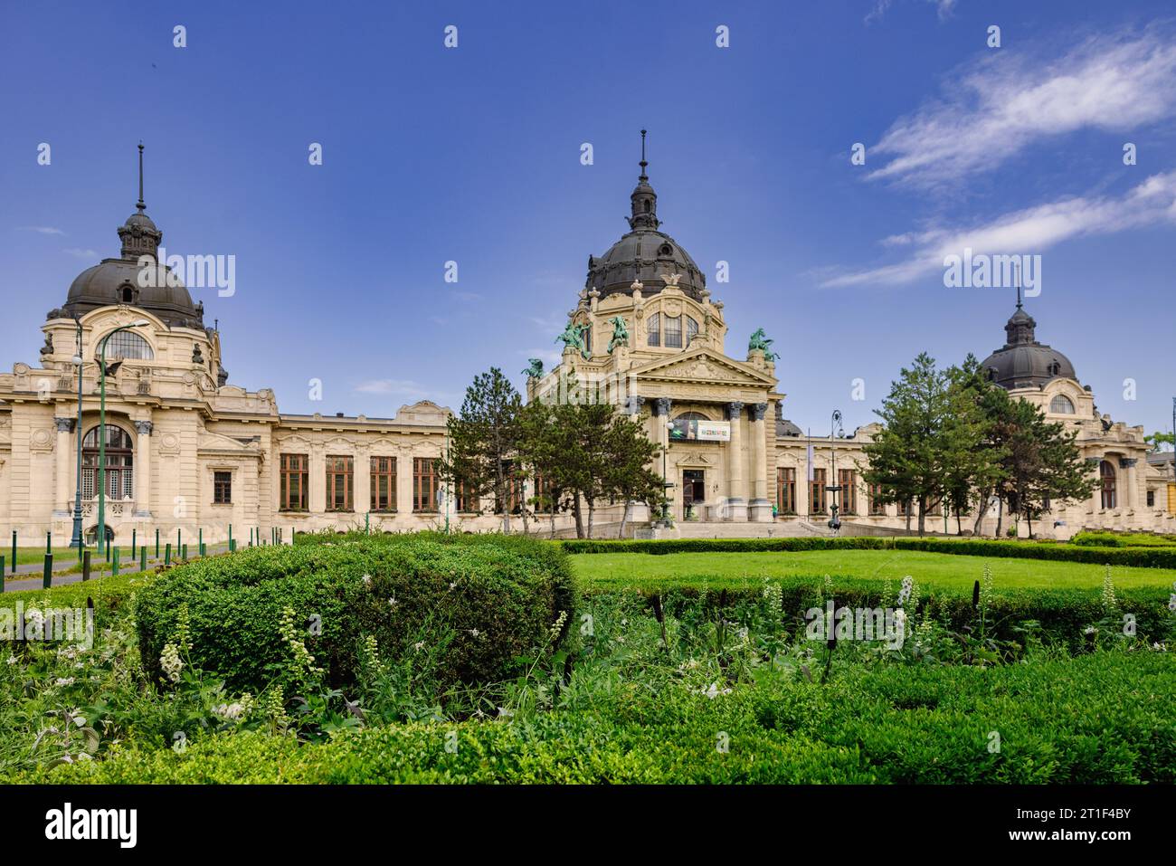 An idyllic landscape featuring two contemporary buildings standing in ...