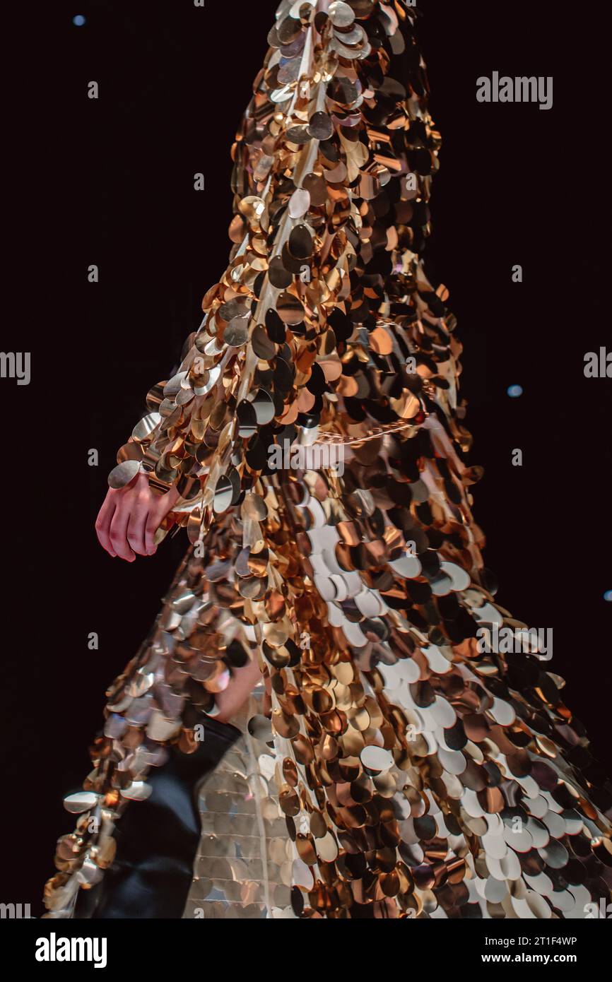 Elegant fashion details of Haute couture golden party dress. Fashion ...