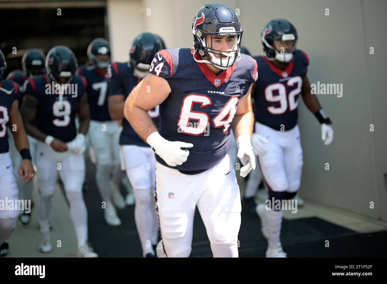 Houston Texans guard Nick Broeker (64) heads to the field before an NFL ...