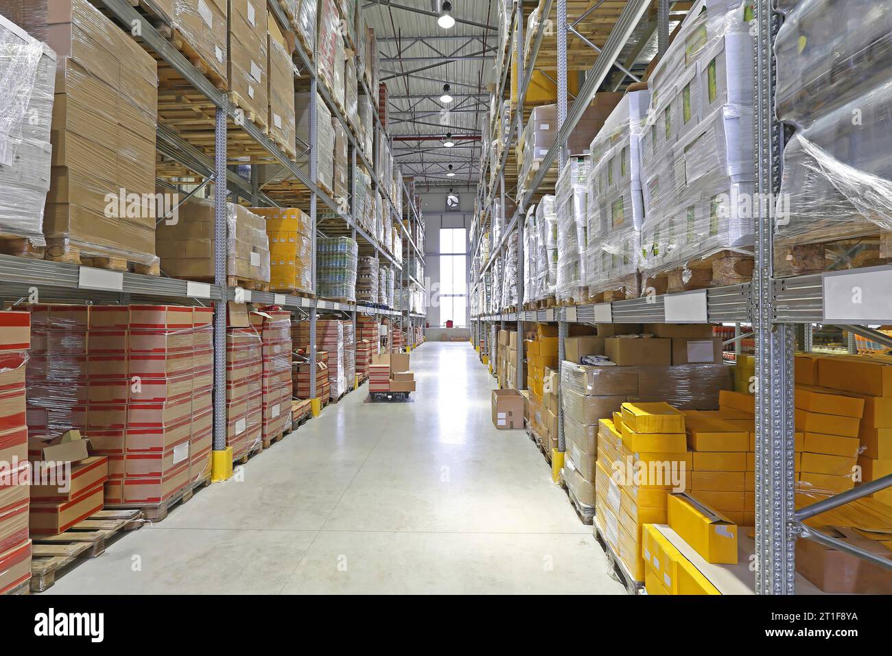 Boxes With Goods at Shelves in Full Capacity Distribution Warehouse ...