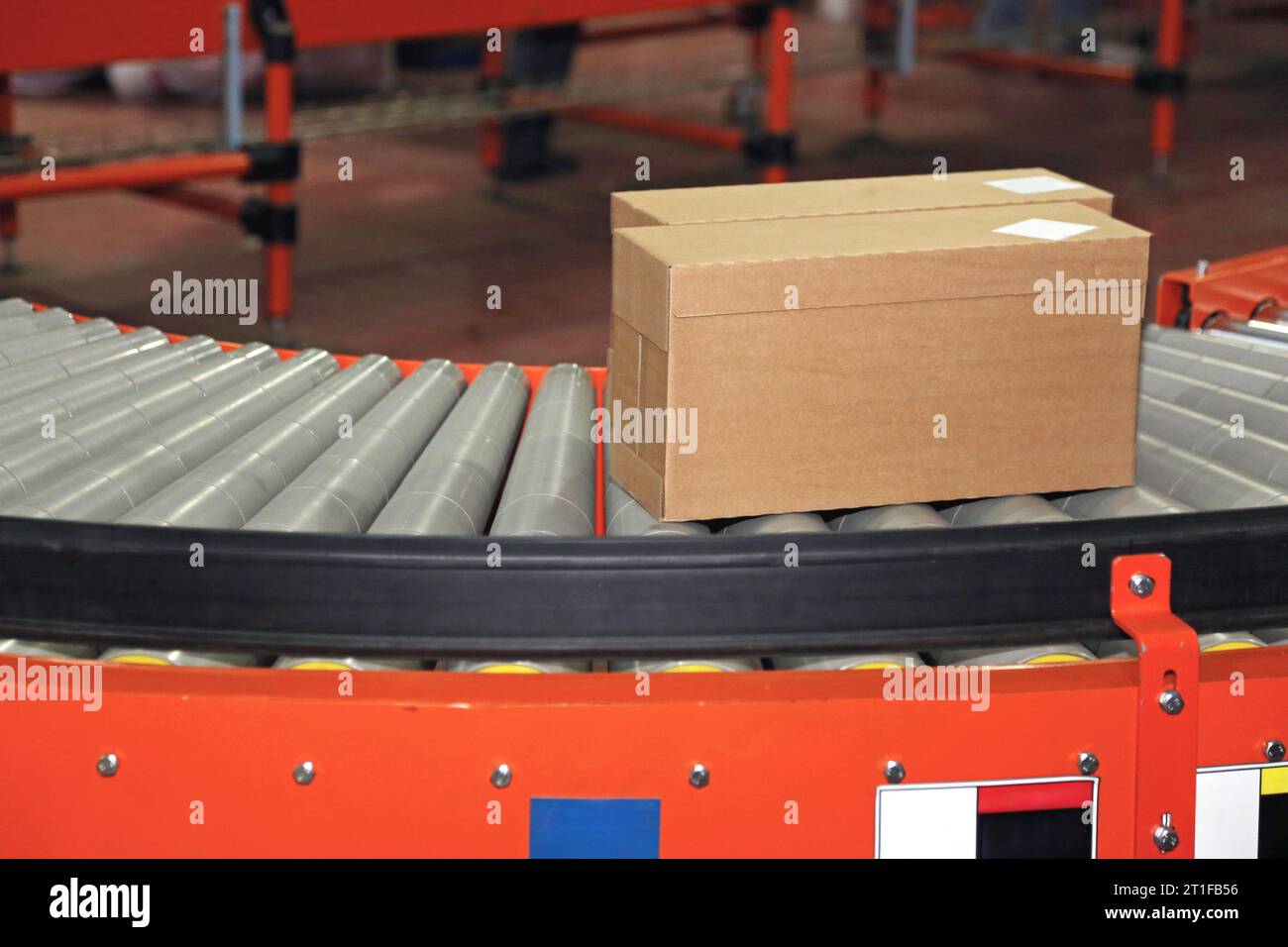 Shipping Cardboard Boxes at Conveyor in Distribution Warehouse Stock ...