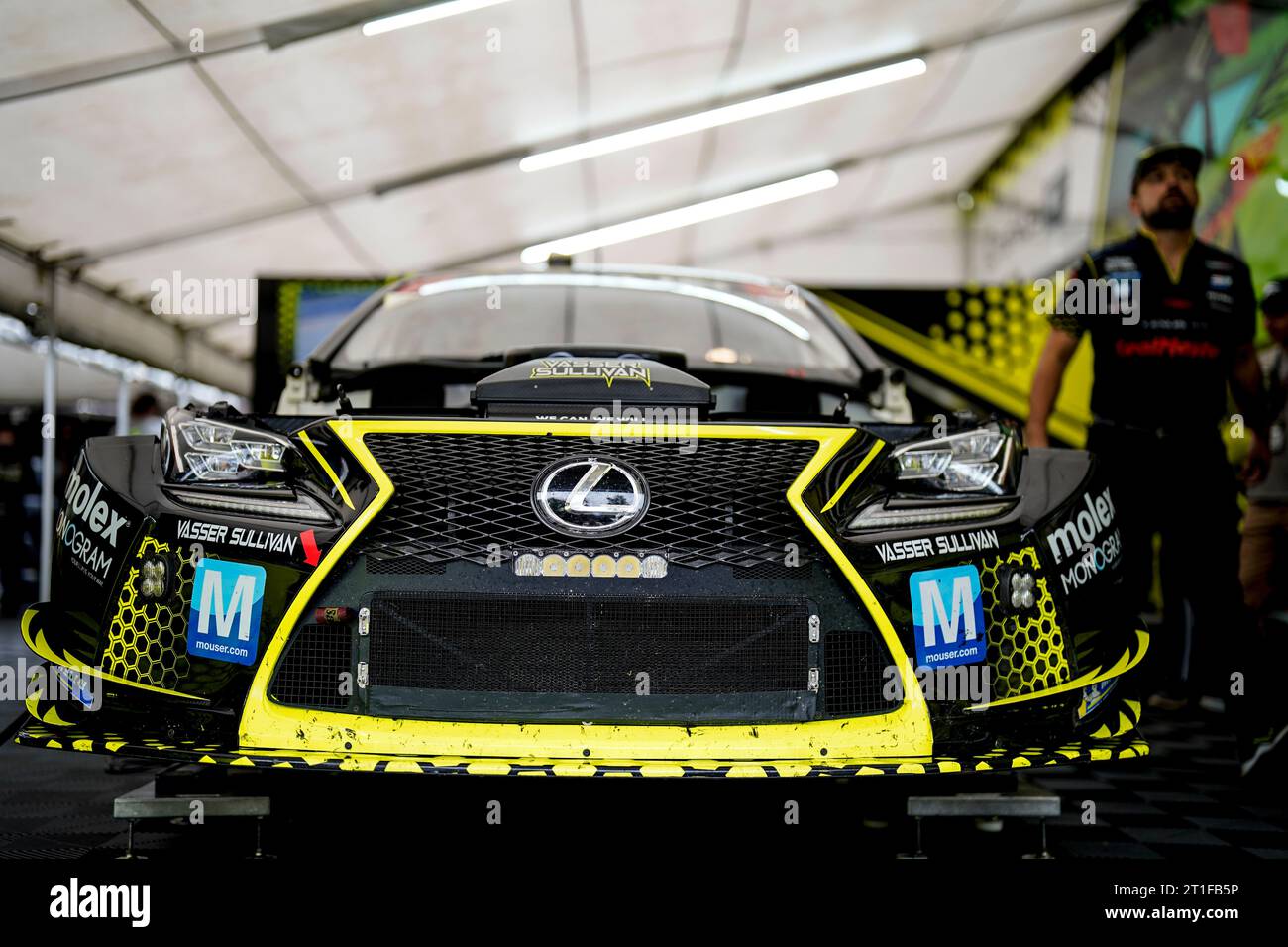 IMSA sports car team Vasser-Sullivan Racing work on their car at Road ...