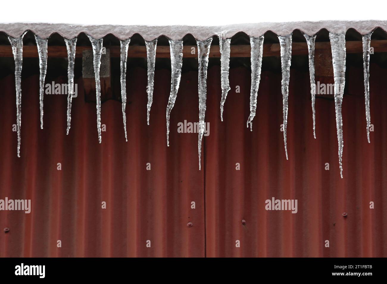 Danger Icicle Frozen Spikes of ice Formed at House Roof Edge Stock ...
