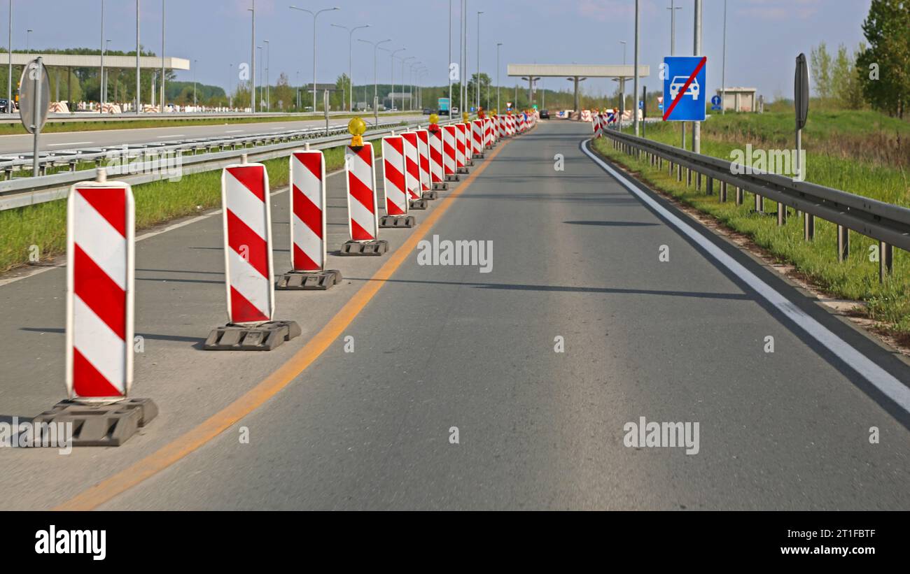 Narrowing Lane at End of Highway Exit Europe Stock Photo - Alamy