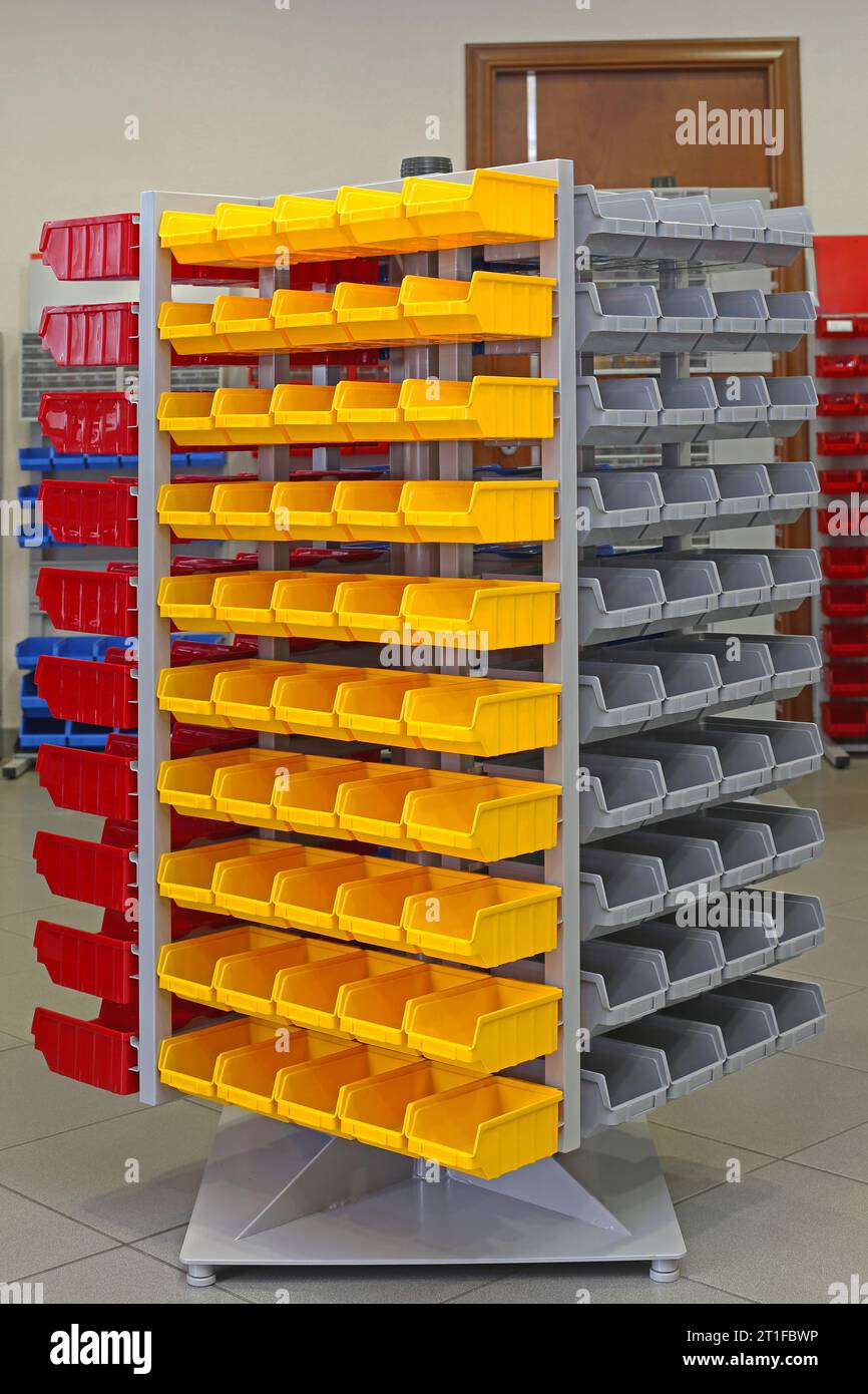 Storage Organizer Rotating Tower With Plastic Bins and Trays Stock ...