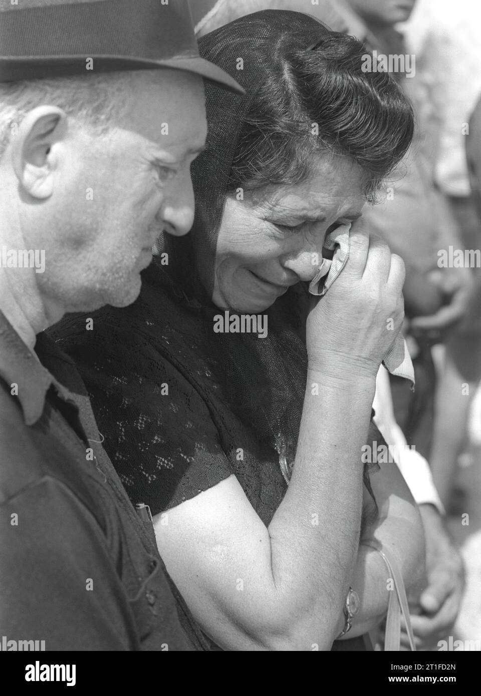A BEREAVED MOTHER CRYING DURING MEMORIAL SERVICE FOR THE FALLEN OF THE ...