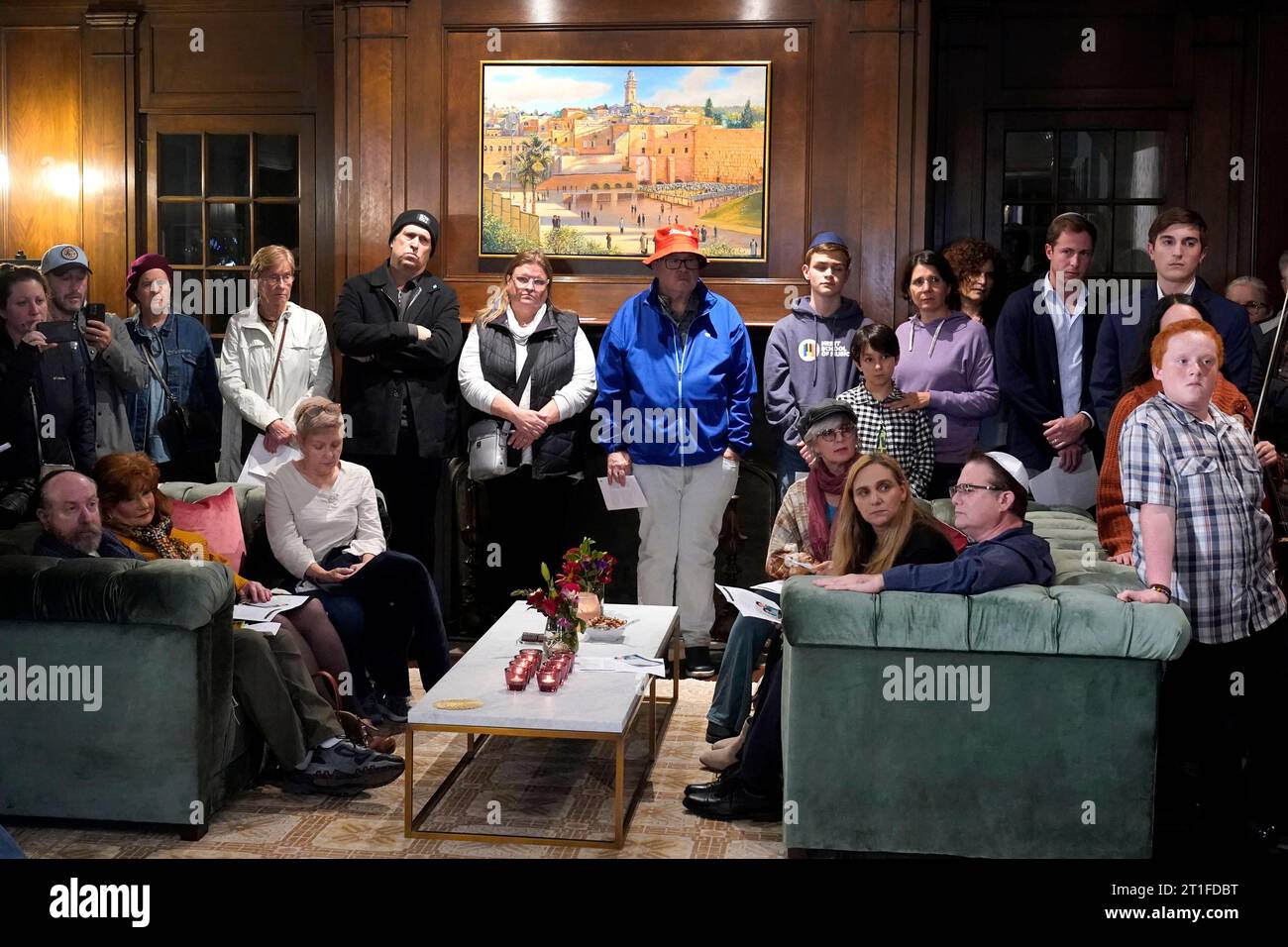 Members of the Chabad of Evanston, Ill., attend a prayer vigil for ...