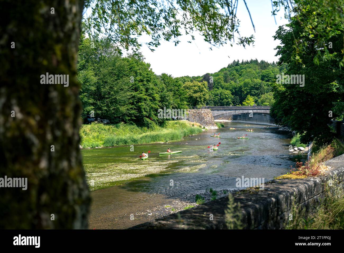 Canoe and kayak on the river Ourthe passing the village of Durbuy in ...