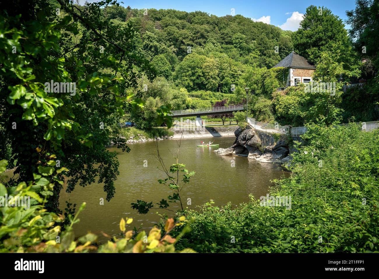 Canoe and kayak on the river Ourthe passing the village of Durbuy in ...