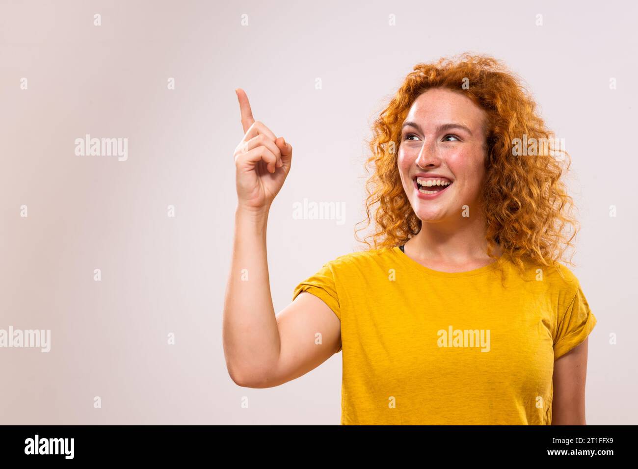Woman thinking having idea pointing hi-res stock photography and images ...