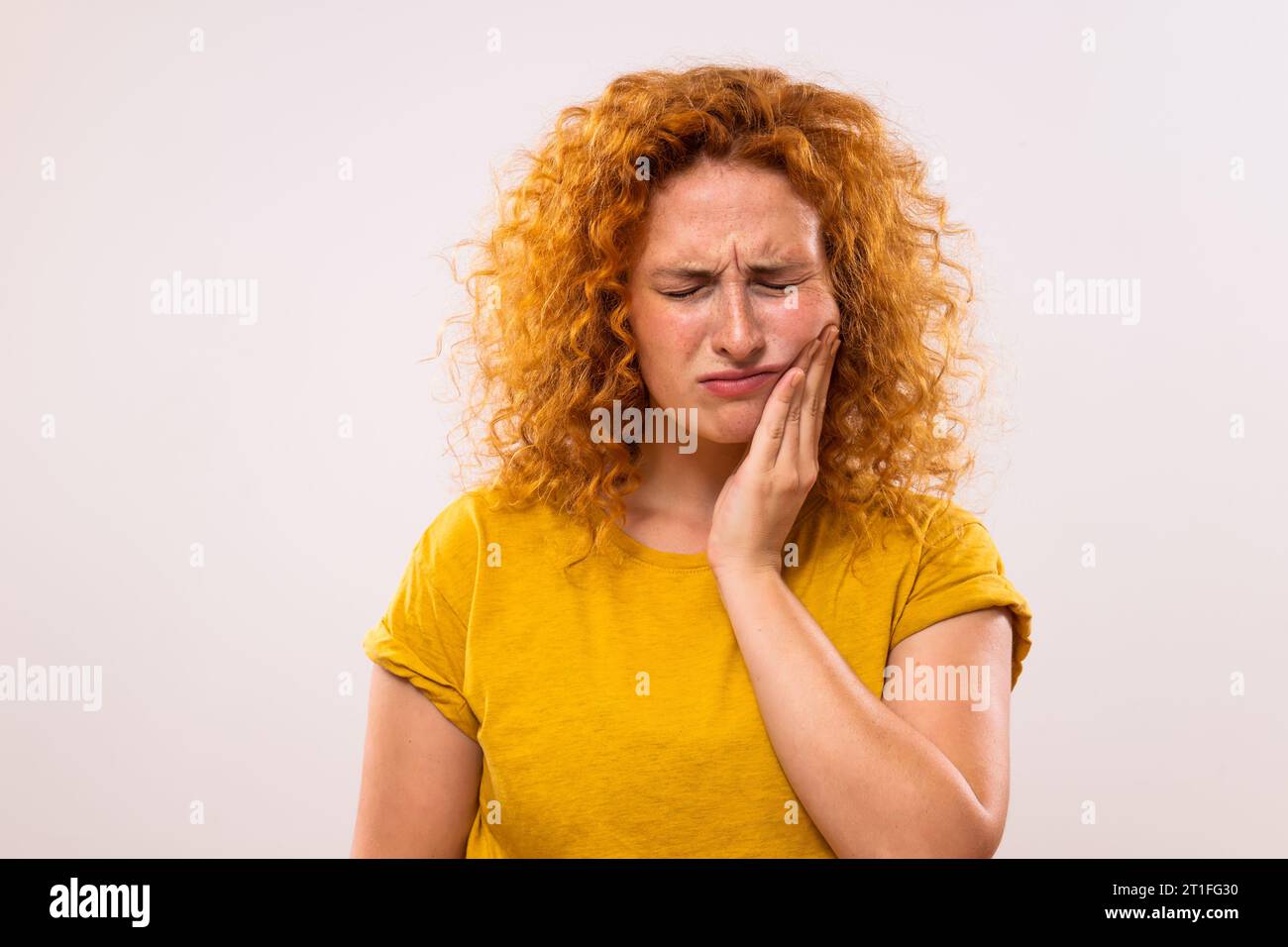 Ginger woman is having toothache Stock Photo - Alamy
