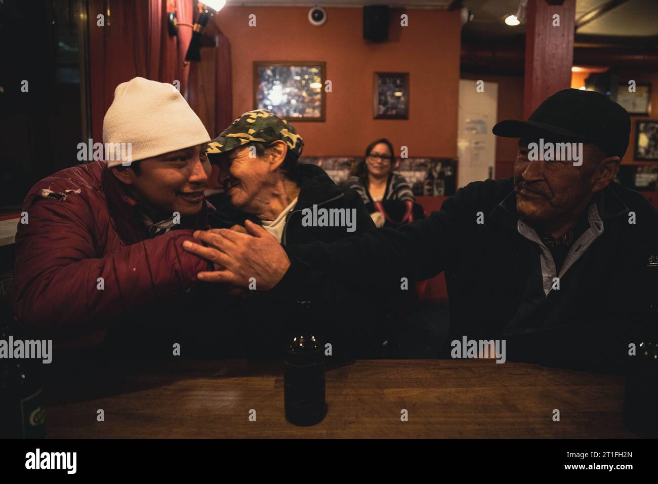 Nuuk, Greenland. 1st Oct, 2023. Locals at the bar discussing life in ...