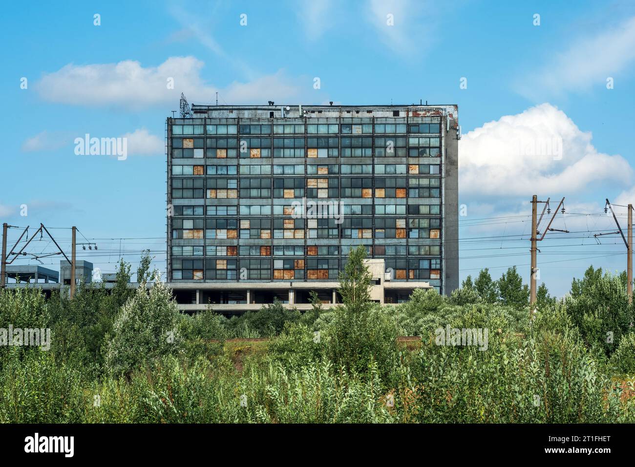 landscape of an industrial city outskirts with an old factory workshop ...