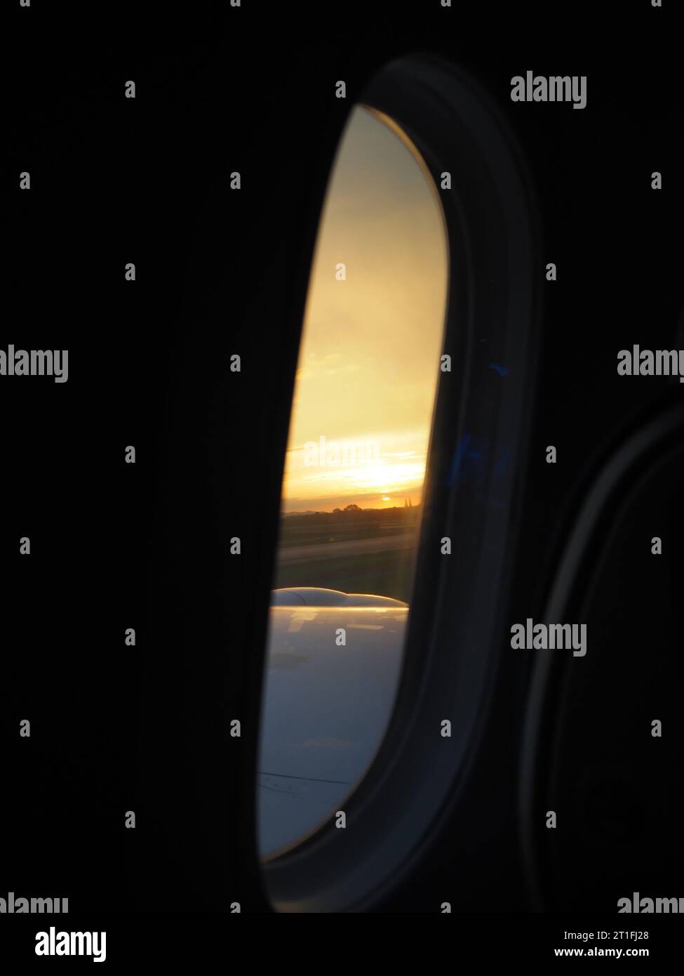 A view from the window of an airplane, wing of the plane in the ...