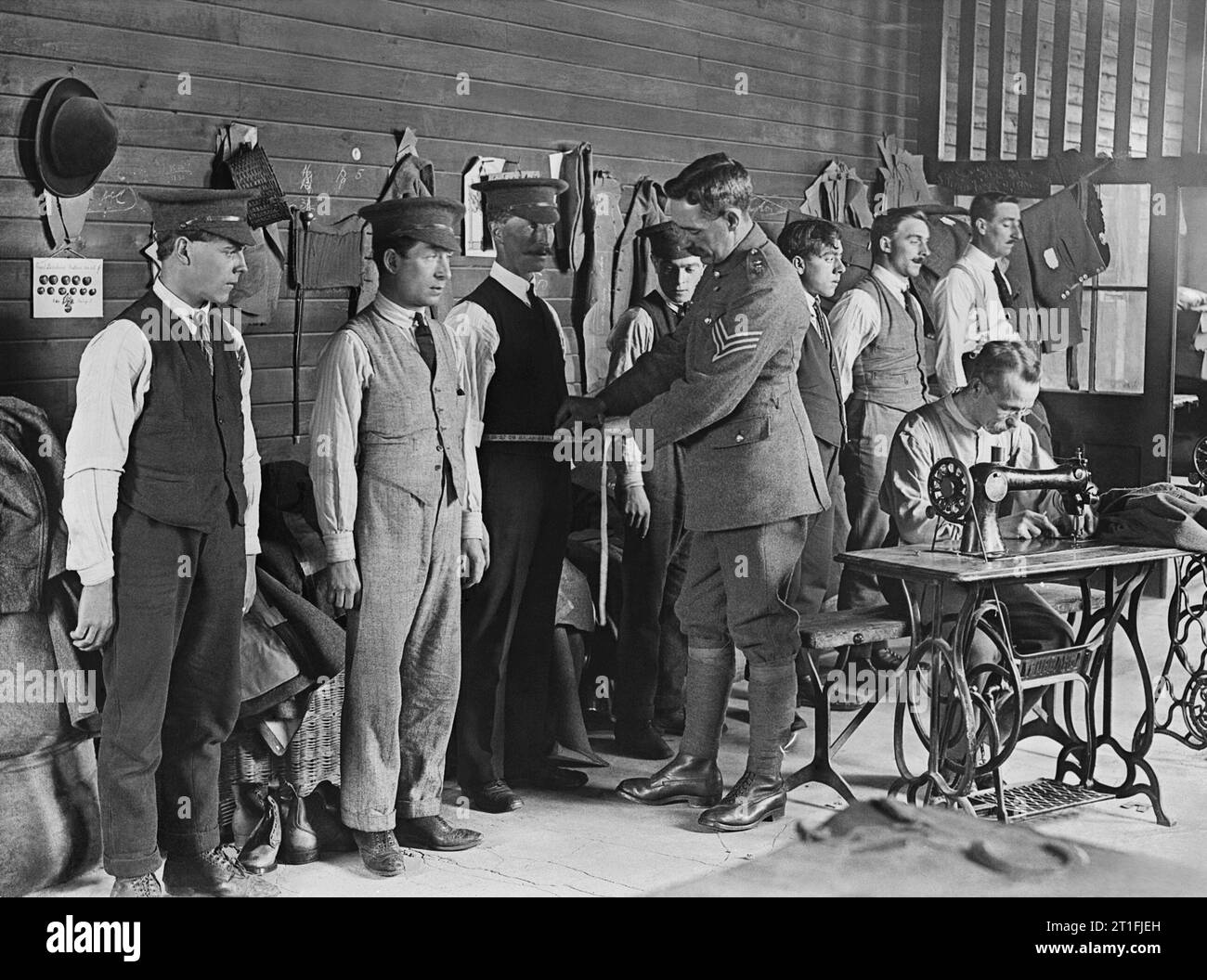 New recruits to the British Army are measured for their uniforms during ...