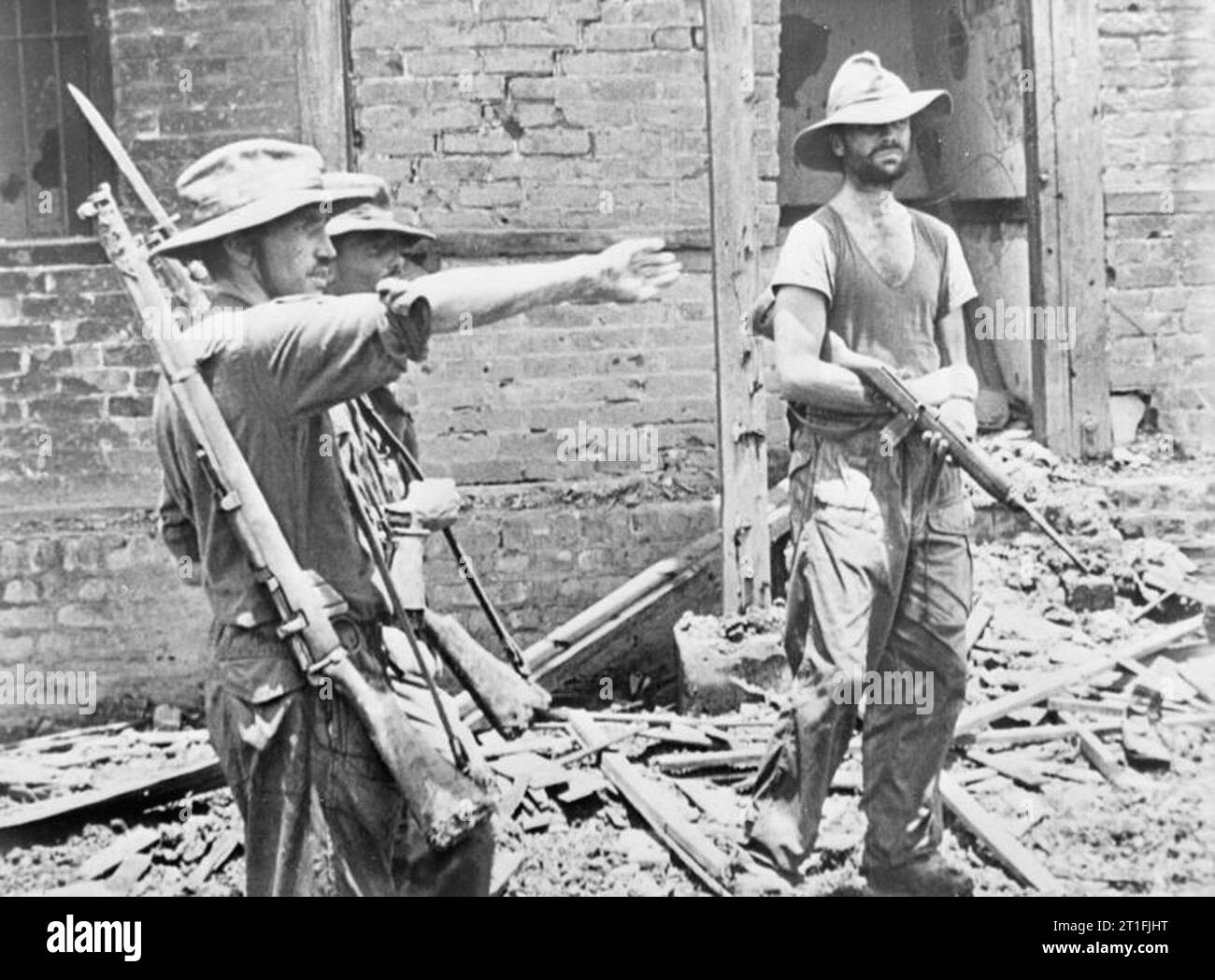The Chindits Brigadier 'Mad' Mike Calvert (left) gives orders to ...