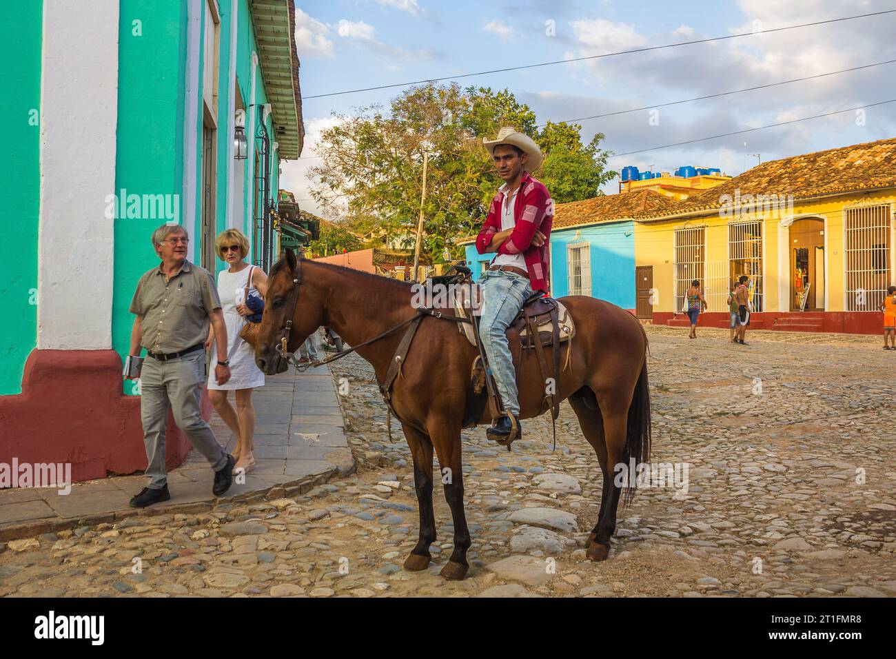 Horse riders in Trinidad, Cuba Stock Photo - Alamy