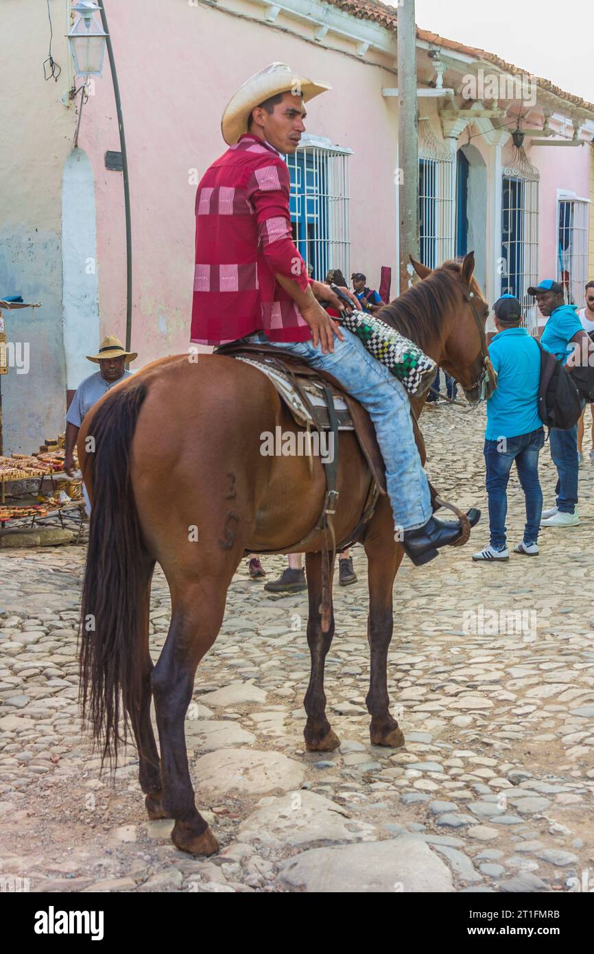 Horse riders in Trinidad, Cuba Stock Photo - Alamy