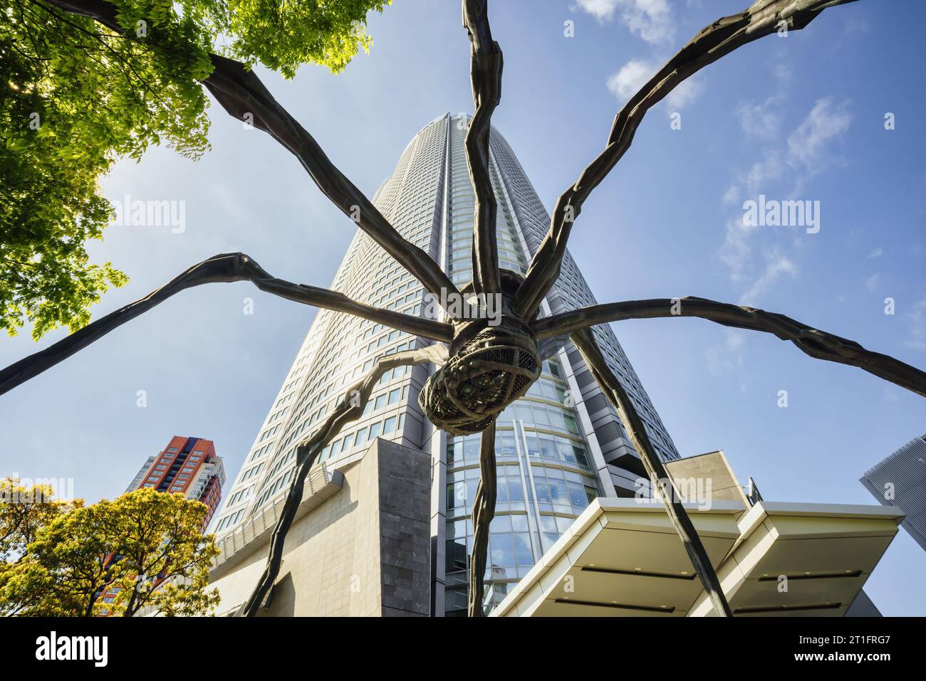 Tokyo, Japan - April 08: Roppongi Hills Mori Tower with a sulpture in ...