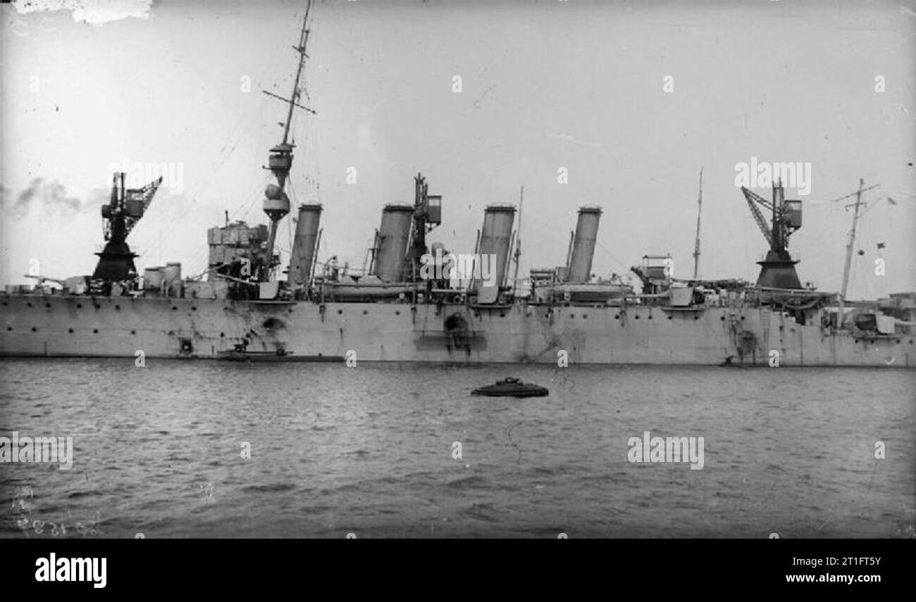 . British light cruiser HMS CHESTER, showing damage sustained at the ...