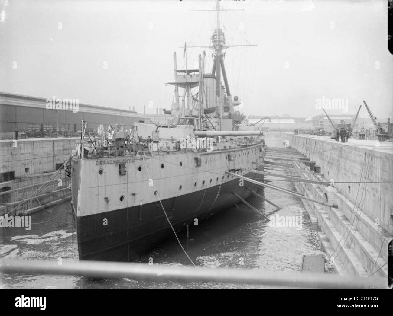 Photograph of HMS Dreadnought in dry dock at Portsmouth during a refit ...