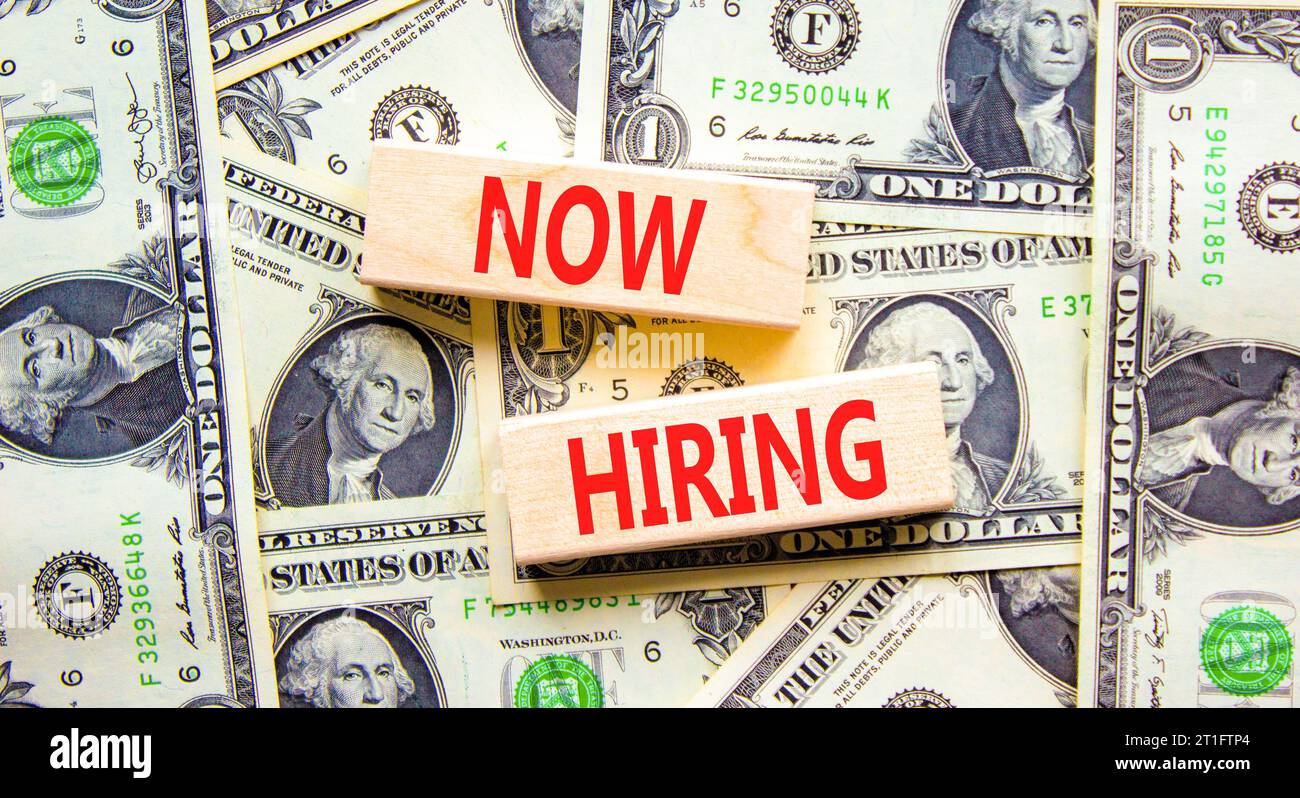 Now hiring symbol. Concept words Now hiring on beautiful wooden block ...