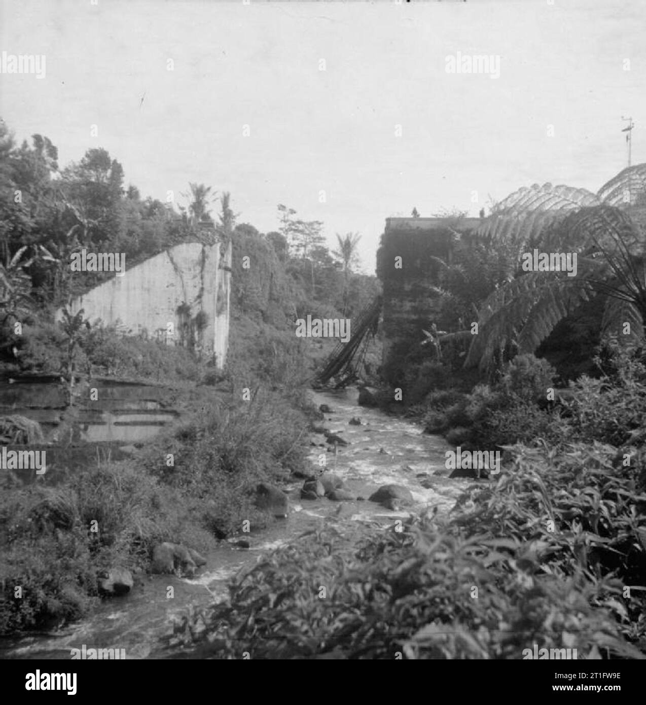 British Occupation of Java Wreckage of a road bridge that spanned a ...
