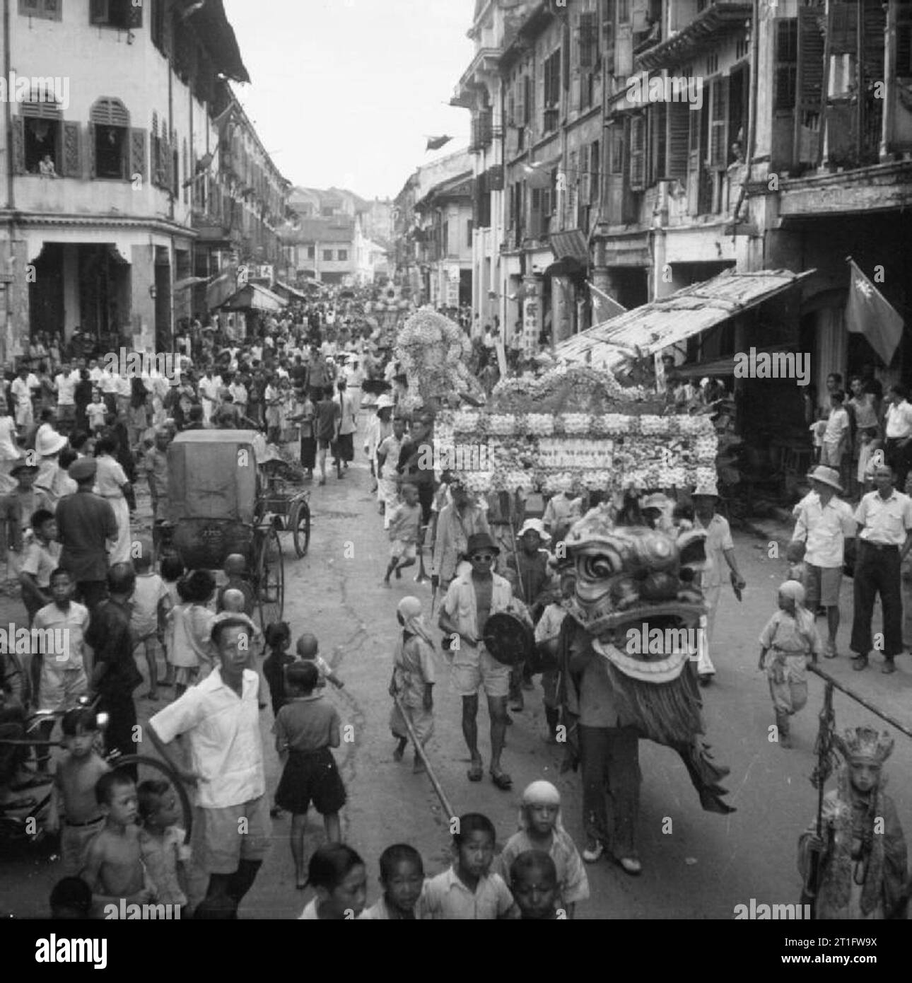 British Reoccupation of Singapore, 1945 Carnival scene in Singapore to ...