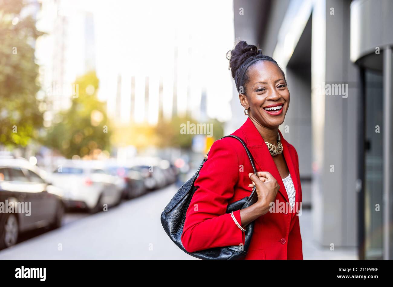 Mature woman walking in city hi-res stock photography and images - Alamy