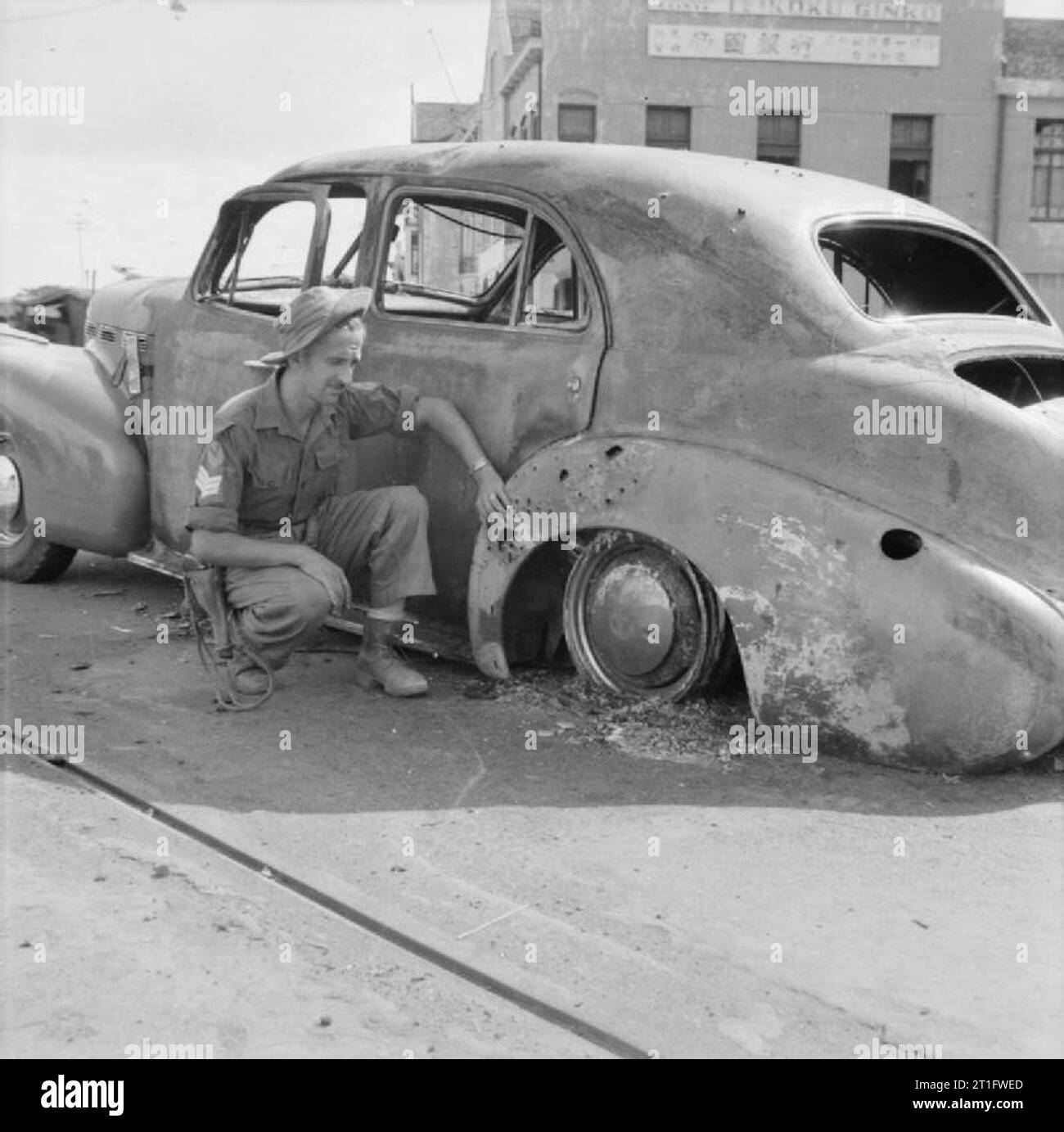 The British Occupation of Java A British sergeant examines the burnt ...