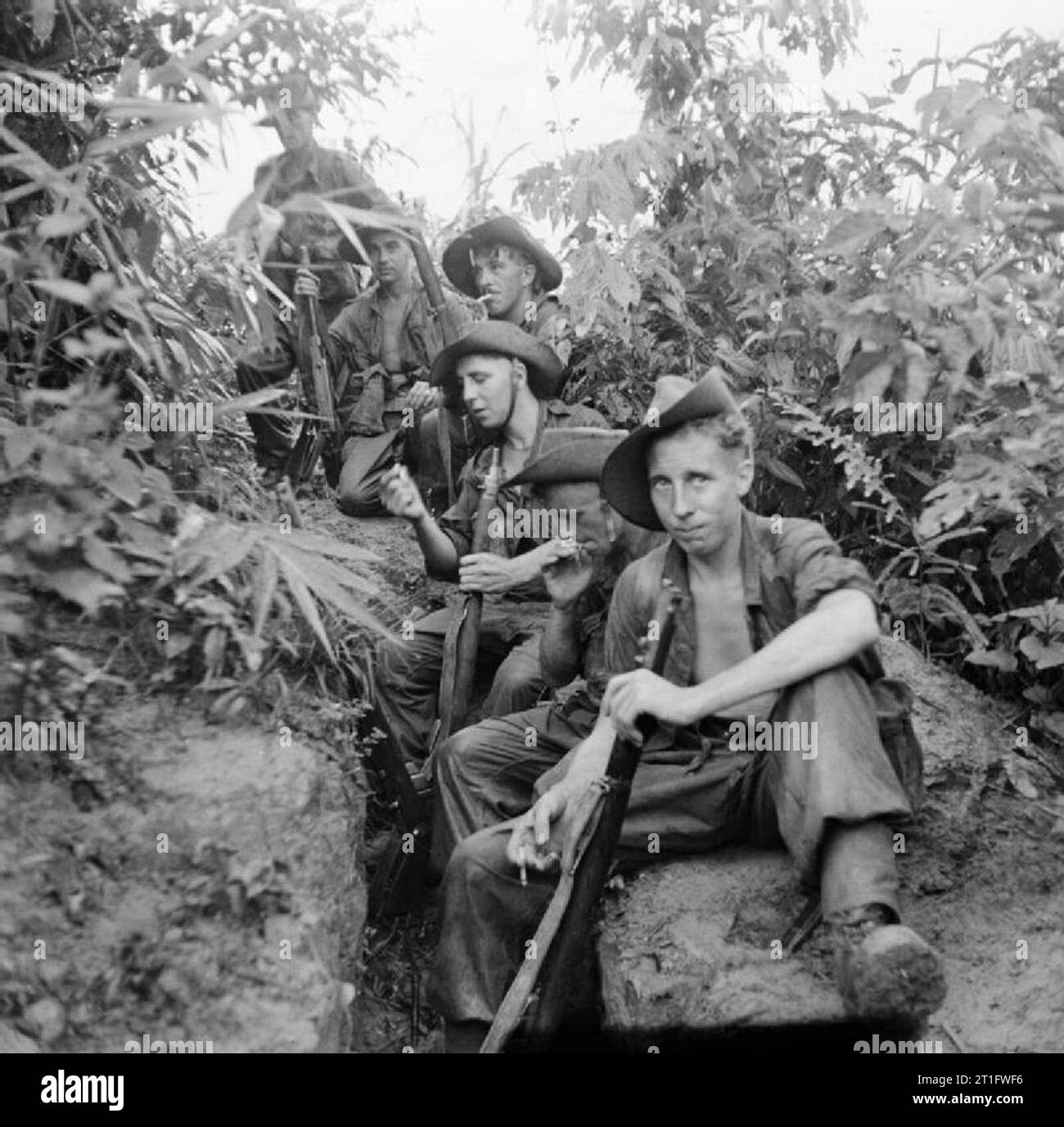 Men of the 2nd Battalion, York and Lancaster Regiment rest while on a ...
