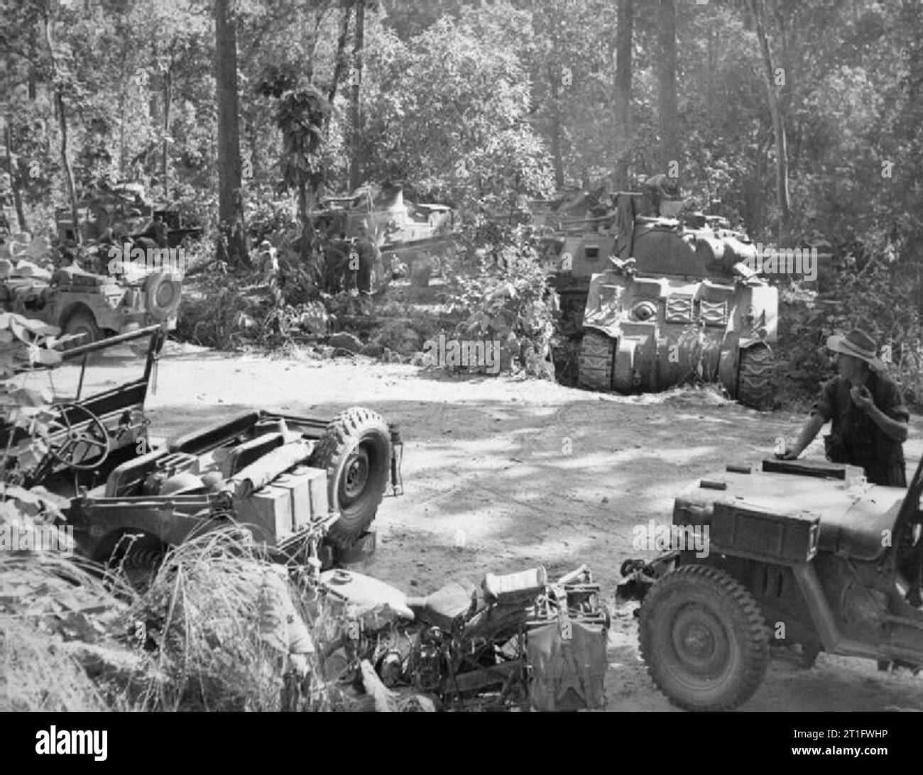 The British Army in Burma 1944 Jeeps and Sherman tanks hidden under ...