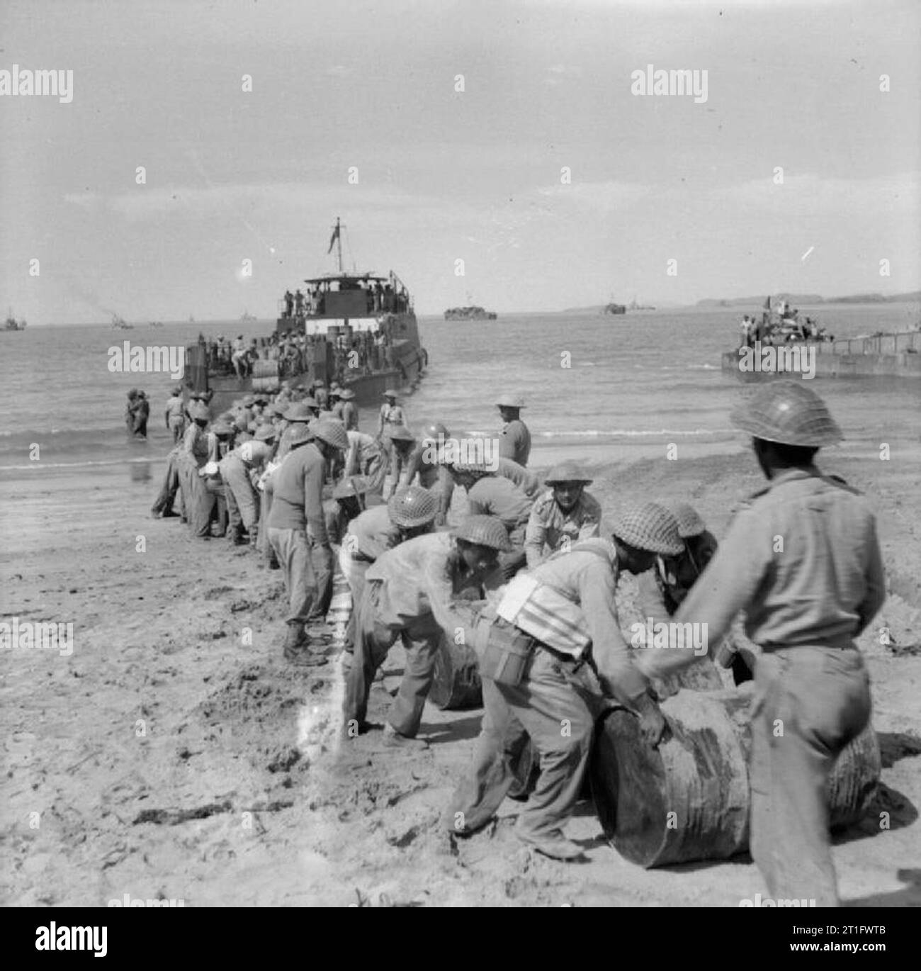 The British Army in Burma 1945 African troops bringing supplies ashore ...