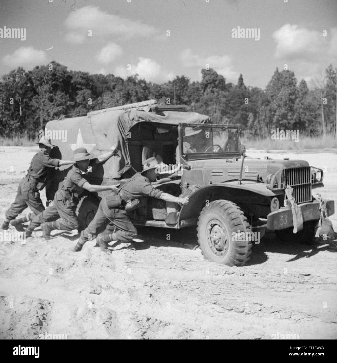 The British Army in Burma 1945 Men of 2nd Division push a Dodge weapons ...