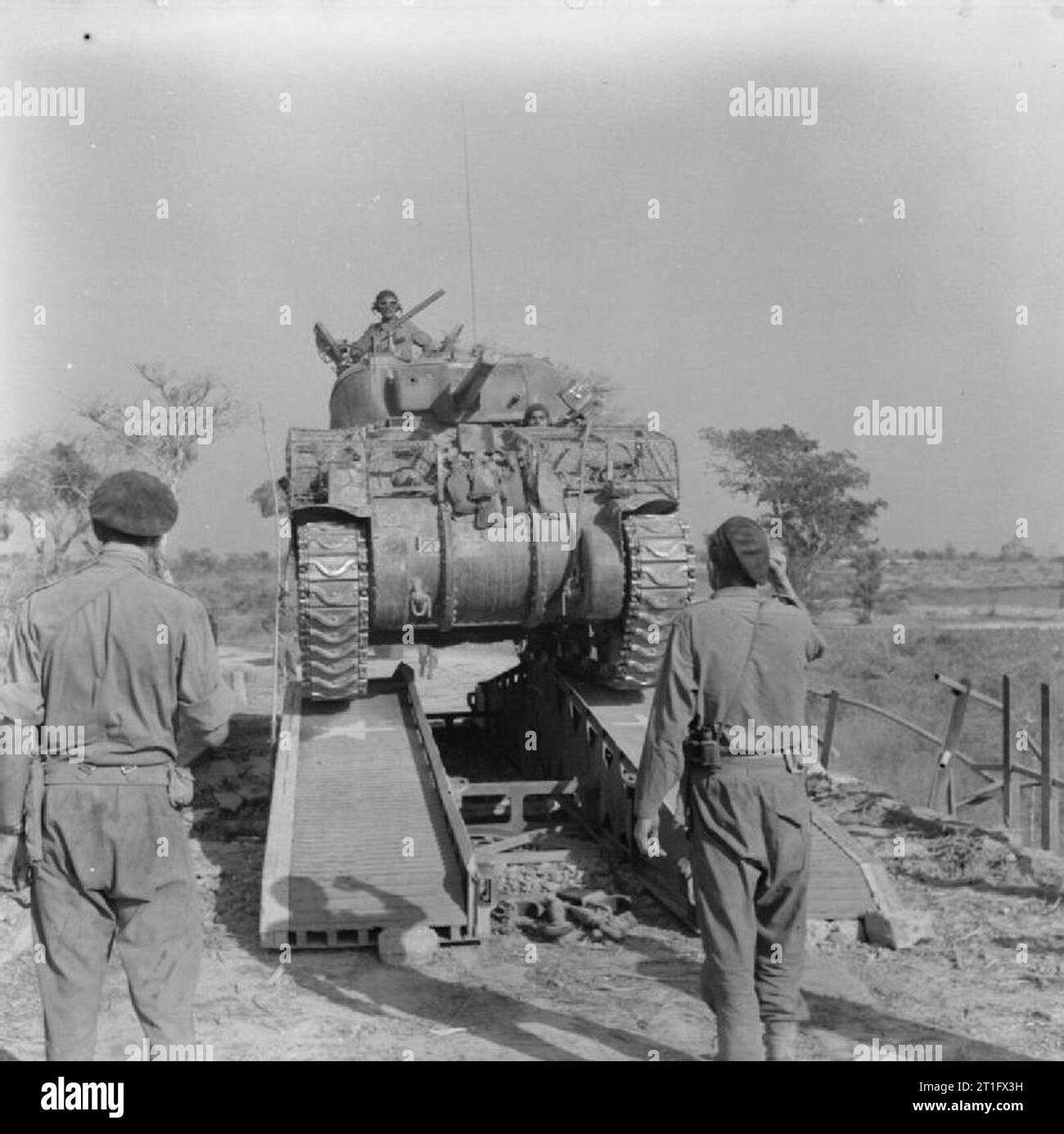 The British Army in Burma 1945 A Sherman tank crosses a scissors bridge ...