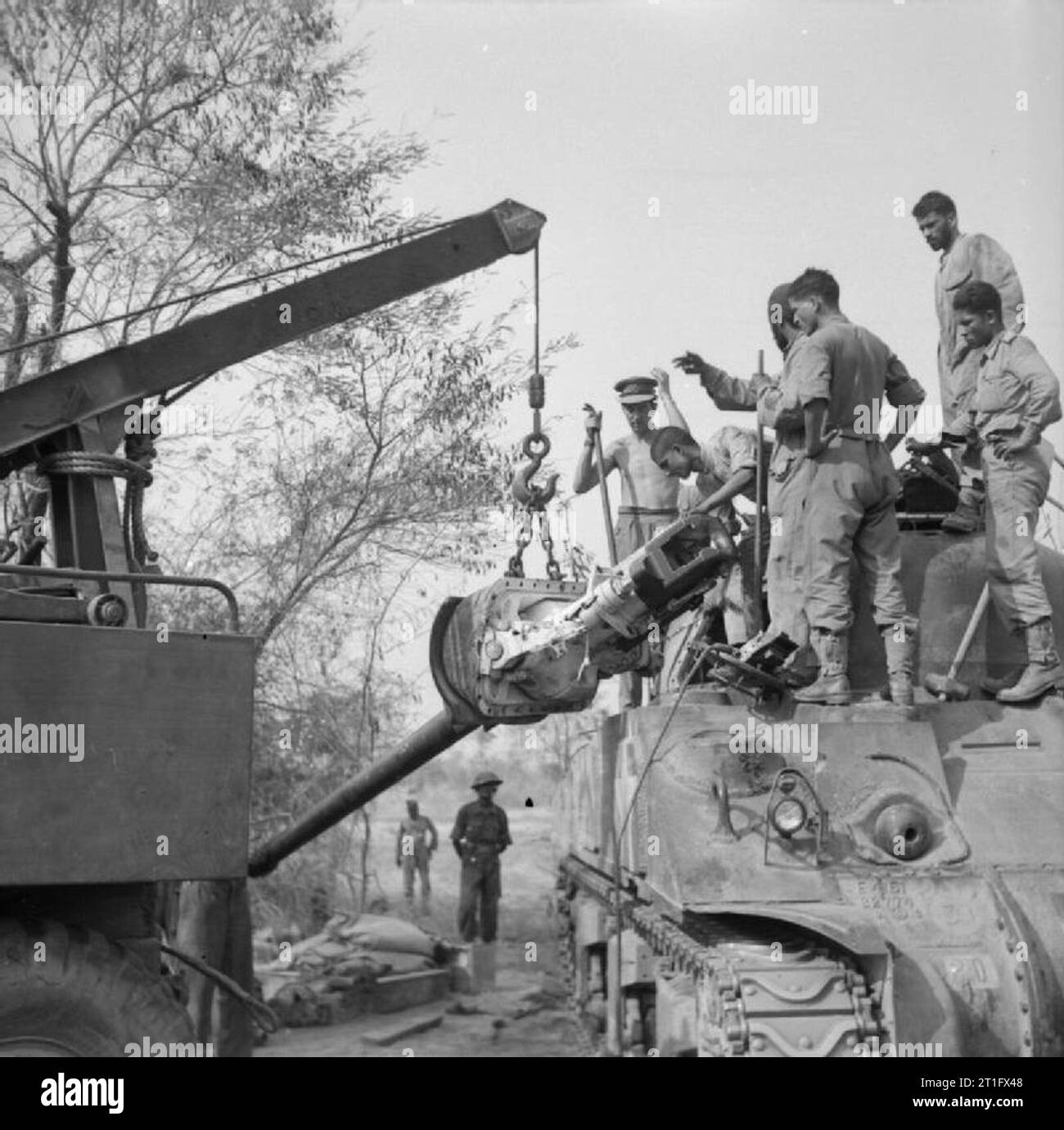 The British Army in Burma 1945 The 75mm gun is lifted out of a Sherman tank at 5th Indian ...