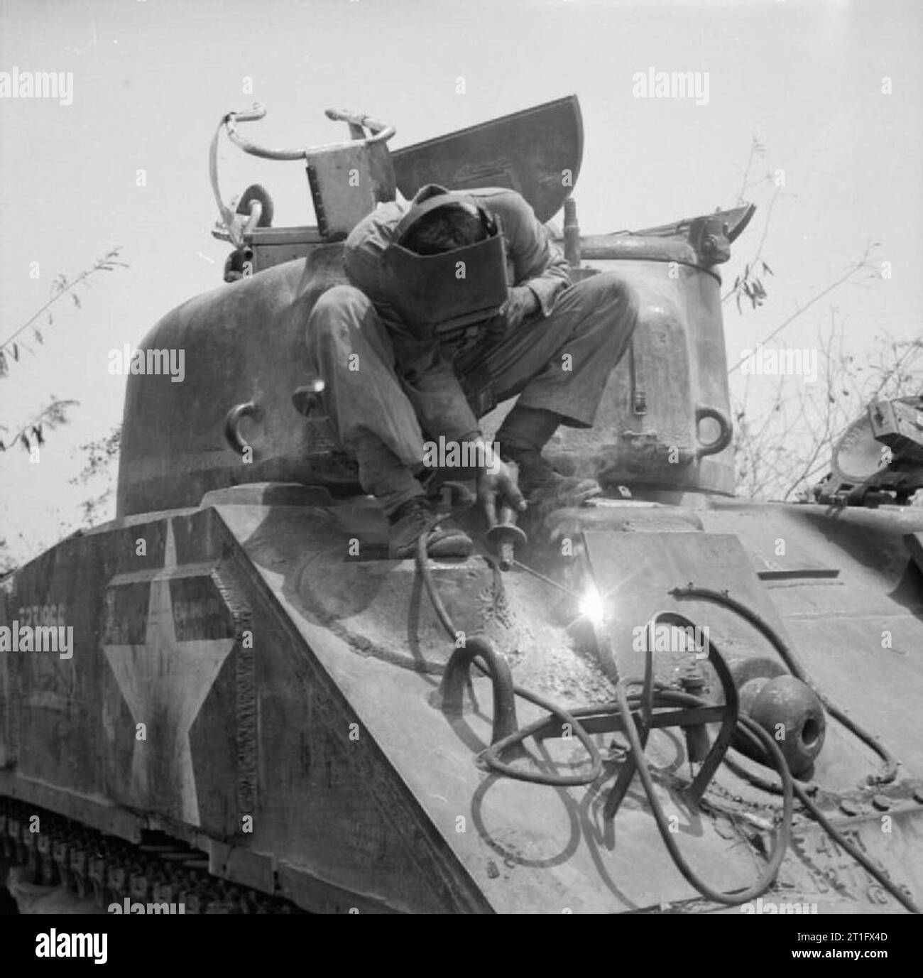 The British Army in Burma 1945 A REME welder repairing battle damage on ...