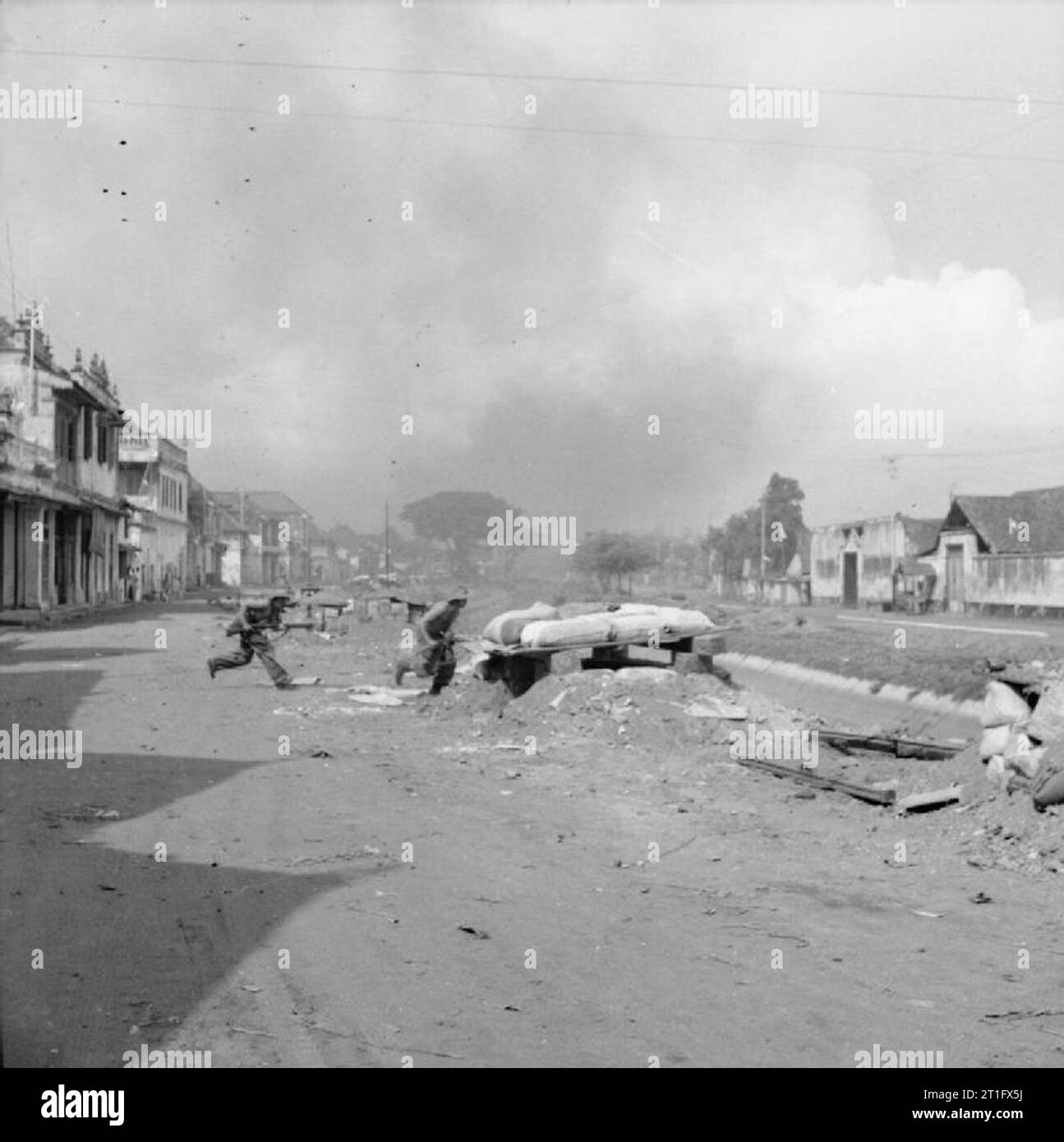 The British Occupation of Java Two British infantrymen rush across a ...