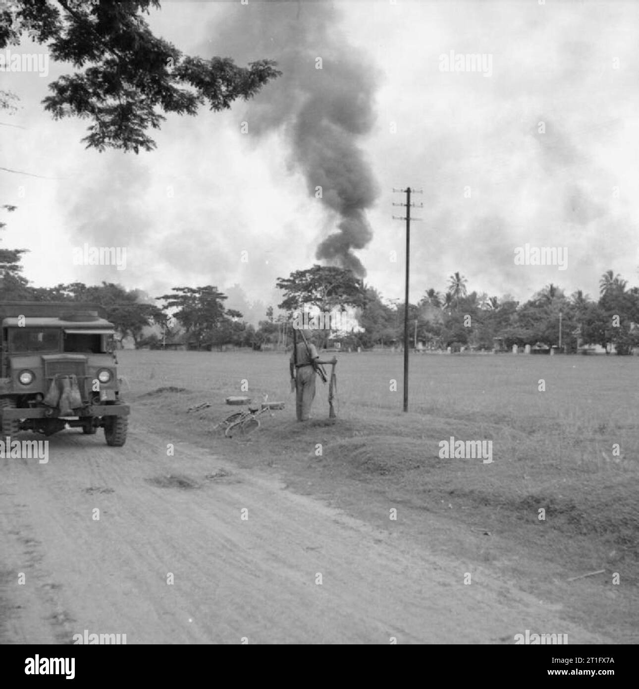 The British Occupation of Java An Indian soldier watch houses burn in ...