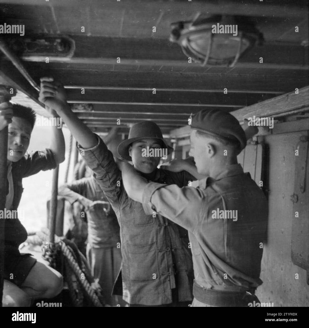 The British Reoccupation of Hong Kong A member of 44 Royal Marine ...