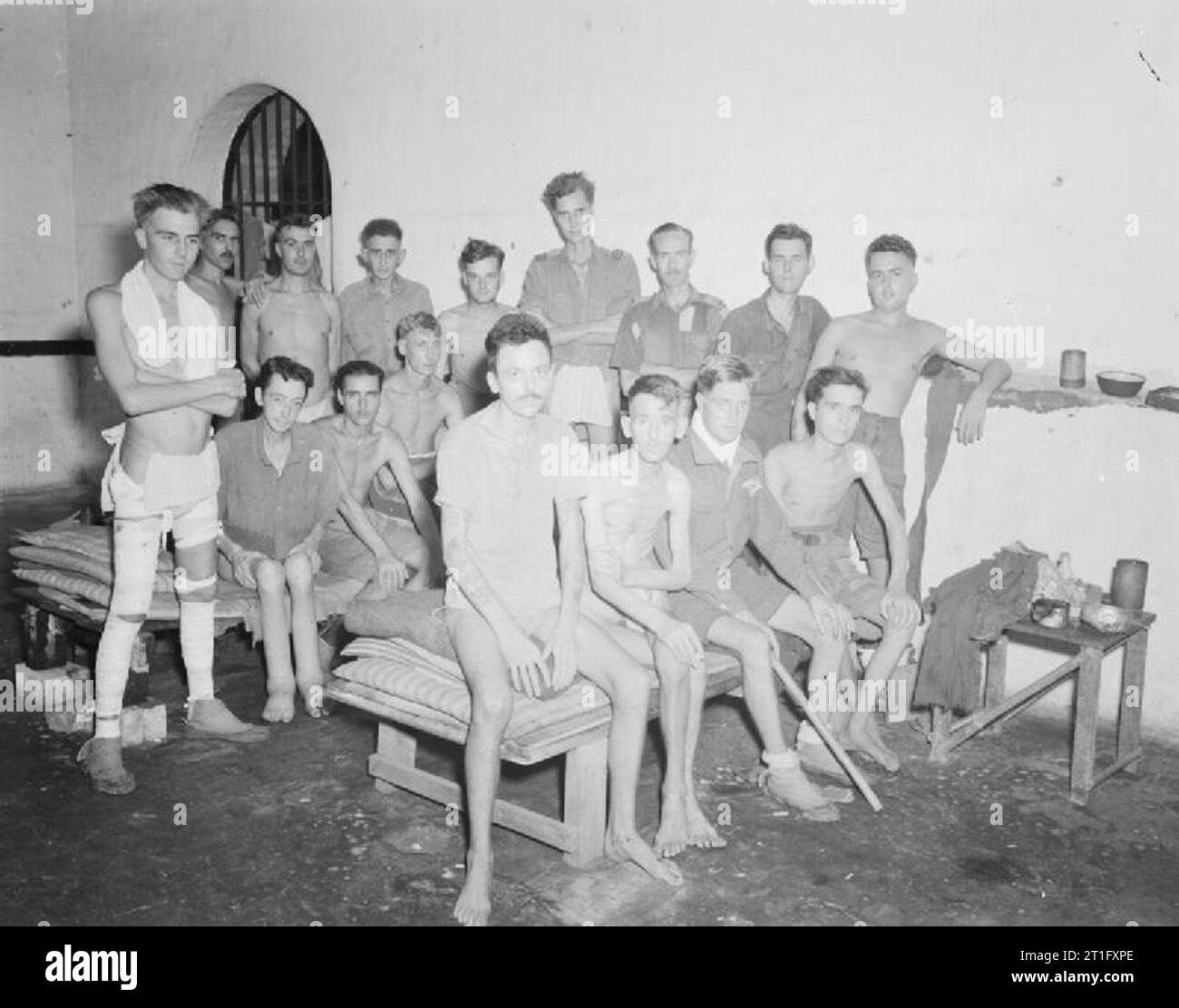The Burma Campaign 1945 A group of sick and emaciated British POWs in Rangoon prison after ...