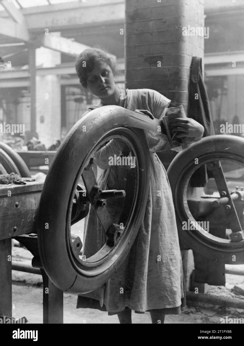 Industry during the First World War A female worker making rubber ...
