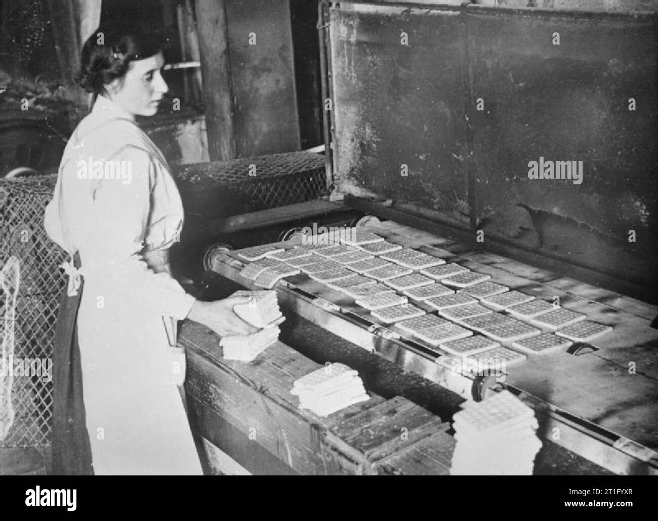 Women's War work 1914-1918 A women worker in a Lancashire biscuit ...