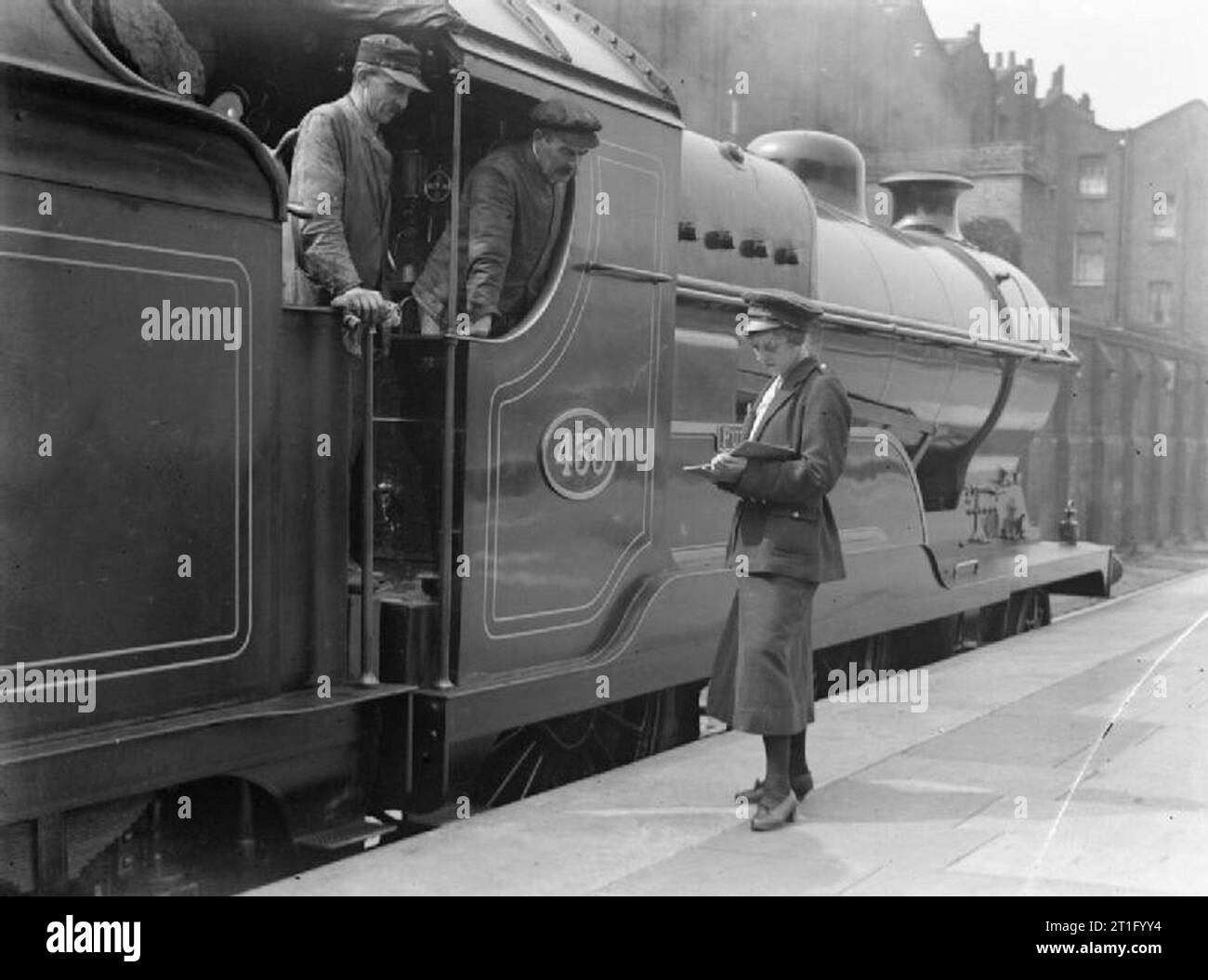 Women's War work during the First World War, c 1918 A female number ...