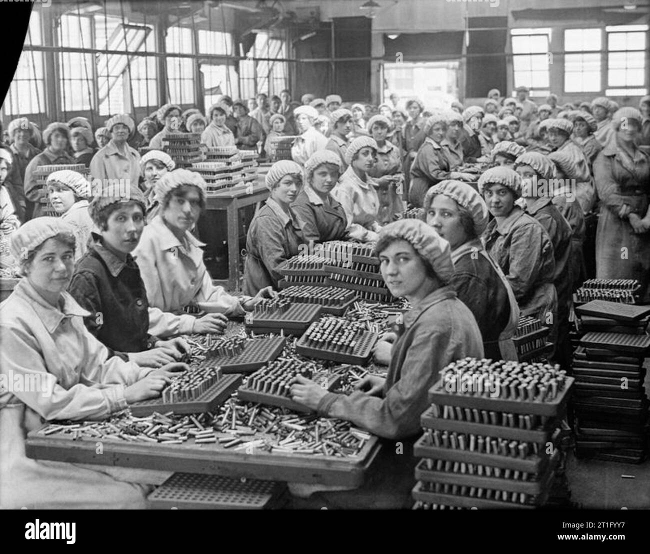 Women munition workers finish small arms cartridges in Small Arms ...