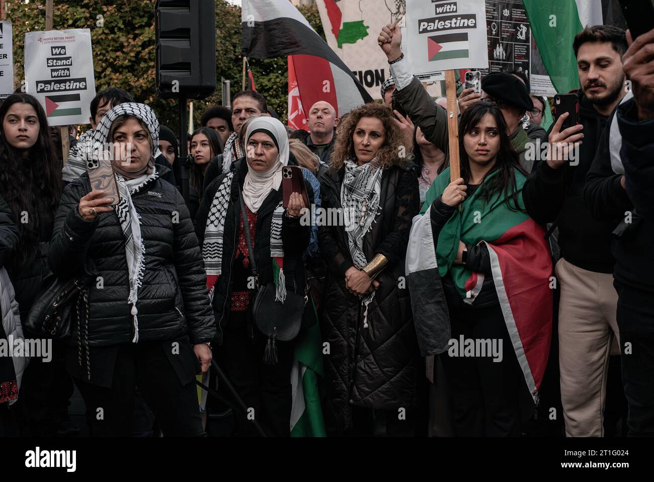 Dublin, Ireland. 13th Oct, 2023. A group of protesters seen listening ...